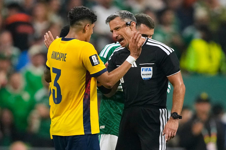 Why are World Cup refs giving red cards to players covering their ...