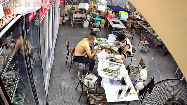 Customer leaves table seconds before fridges fall onto table where he ...