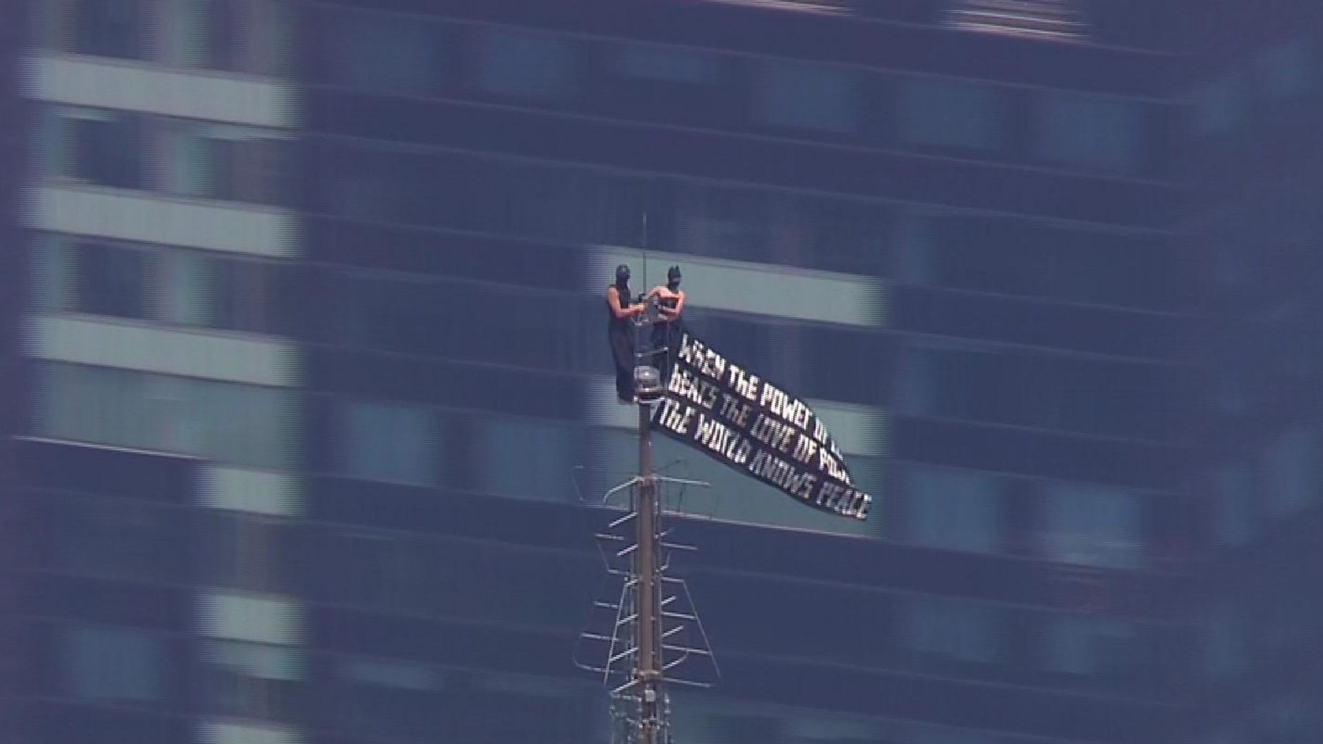 Watch: Two people climb to highest point of Empire State Building
