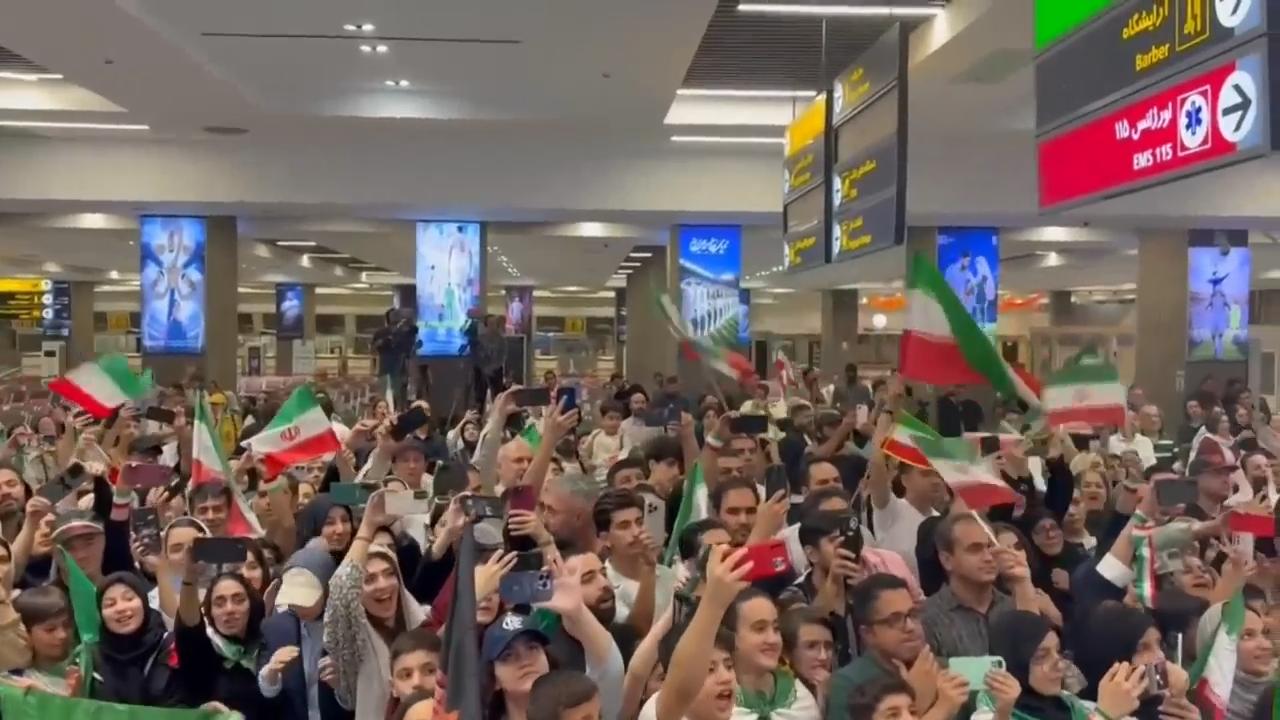 Iran's national soccer team arrives in Tehran after elimination from ...