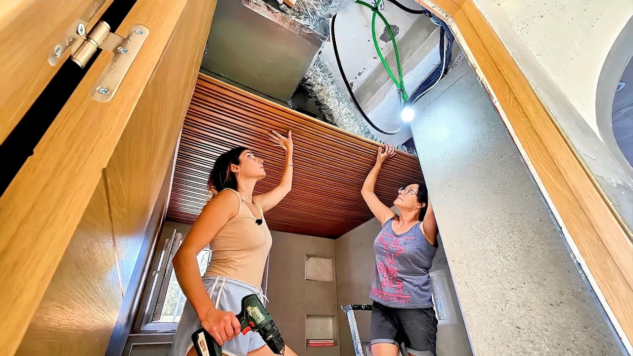 We installed a wood-look ceiling in the bathroom—it looks amazing!
