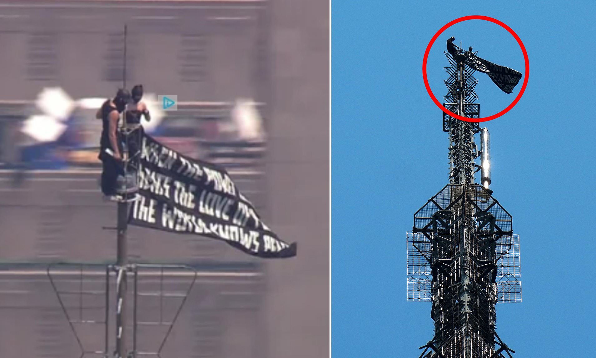Masked pair scale Empire State Building to very top and fly banner ...