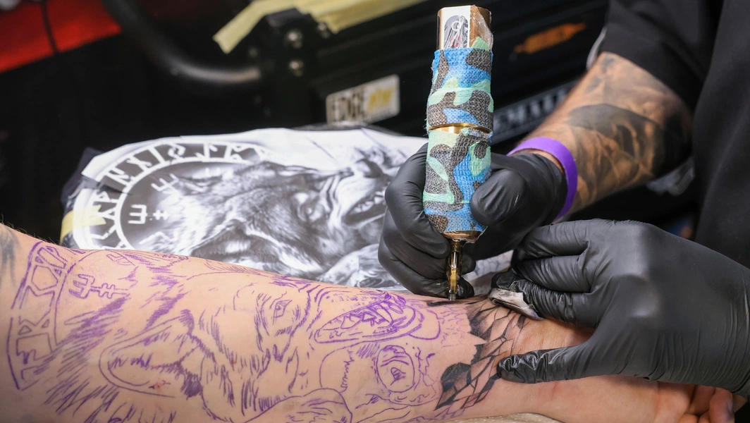 Symbolism, styles, and care of hand tattoos