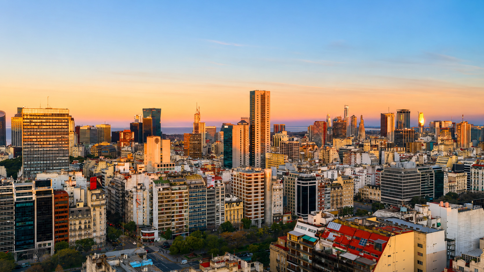 Golden light spilling across a busy city skyline