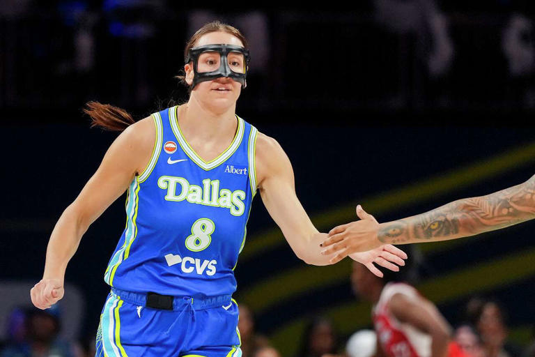 Forward Alanna Smith exits Wings-Sky matchup after suffering injury to ...
