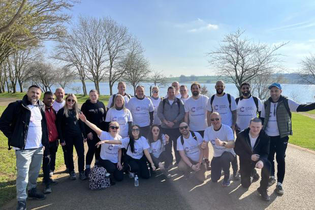Tesco staff lace up for 13‑mile Cancer Research UK walk