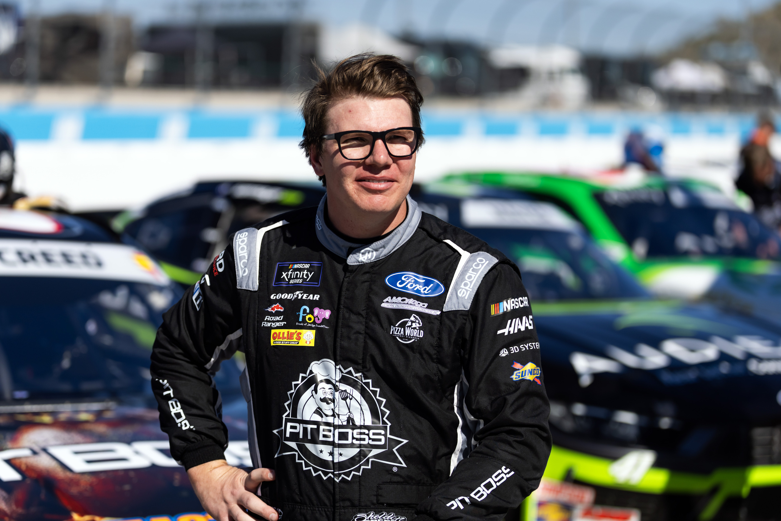 Fan runs onto track, scales fences during red flag in NASCAR race at US ...
