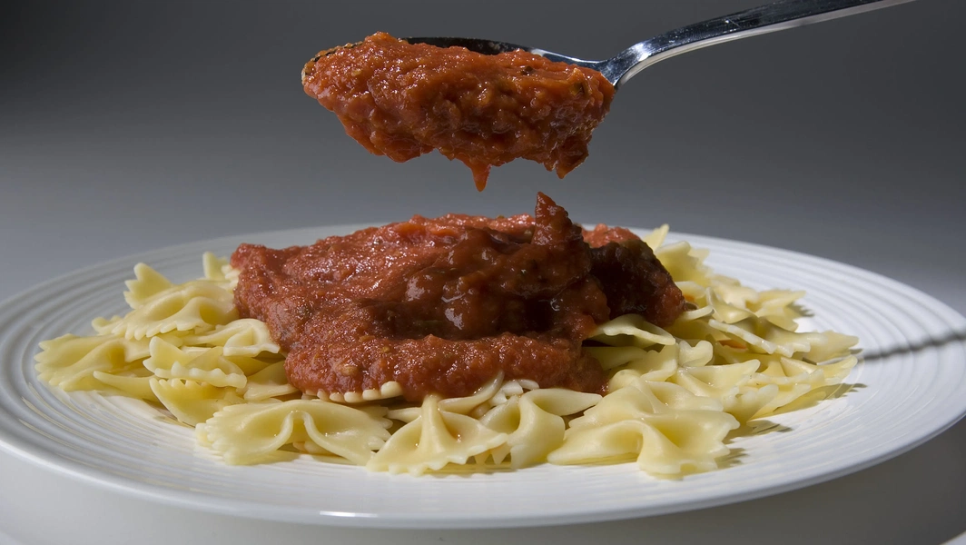 Jarred pasta sauce transforms pork chops into quick gourmet meals