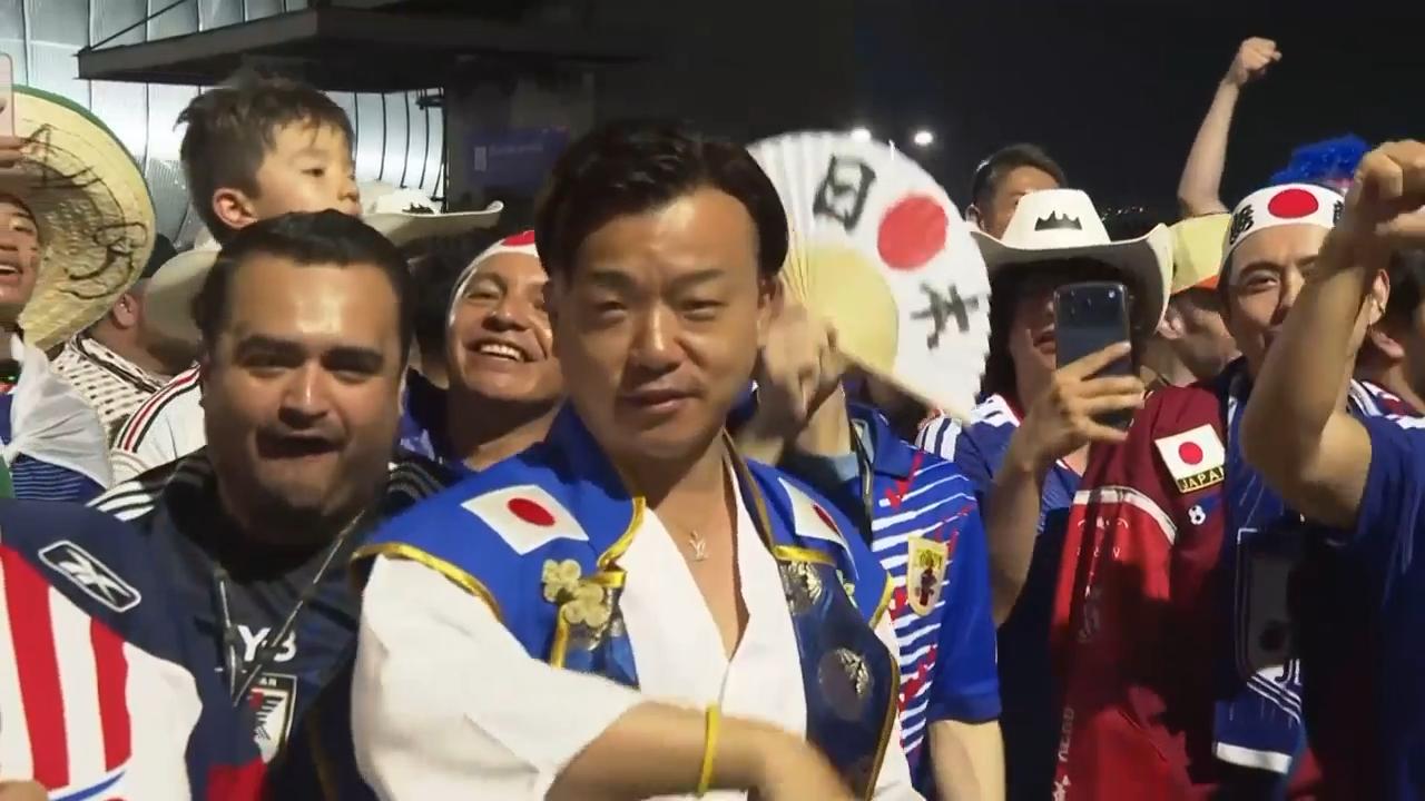 Fans react after Japan's 4-0 World Cup win against Tunisia in Mexico