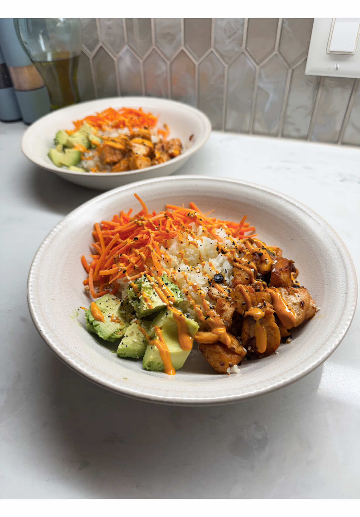 Building fresh chicken avocado rice bowls topped with bright crunchy ...