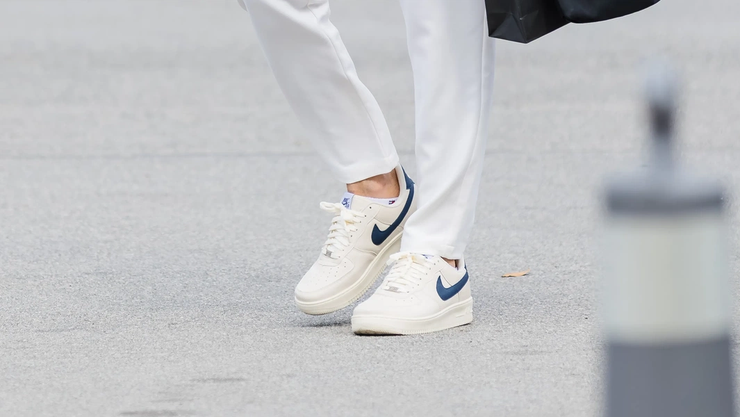 White sneakers cement status as 2026's airport fashion essential