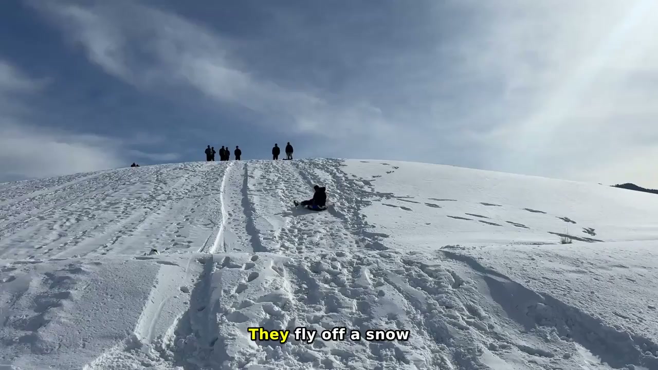Hilarious snow tubing wipeout in Xinjiang!