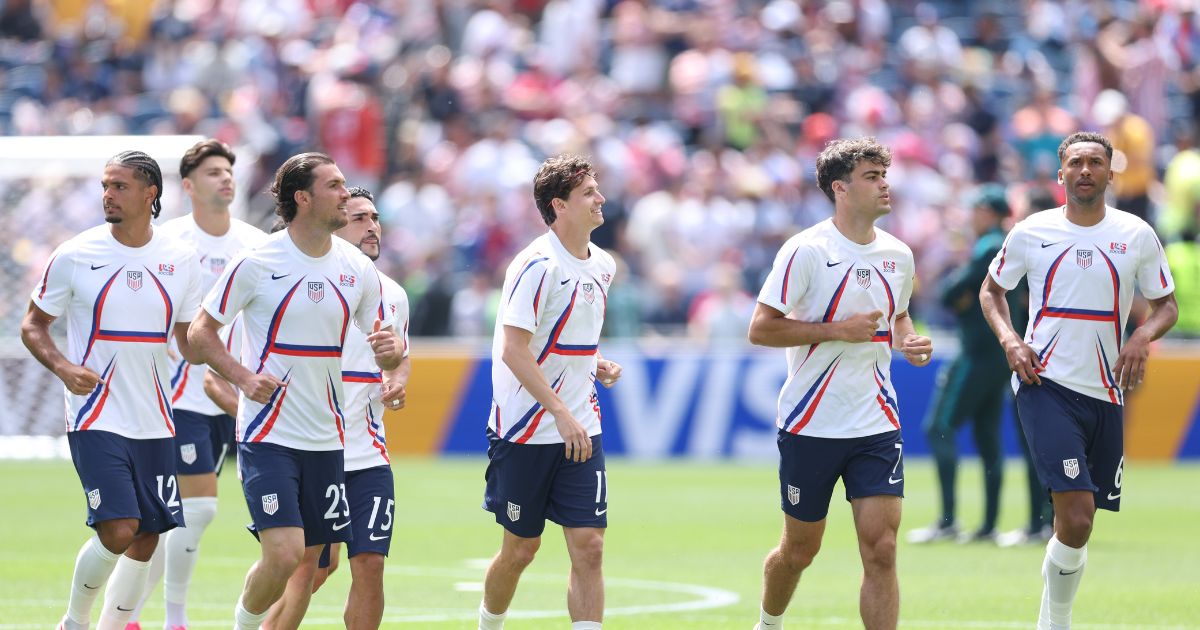 Entire US soccer team huddles in prayer after historic World Cup win