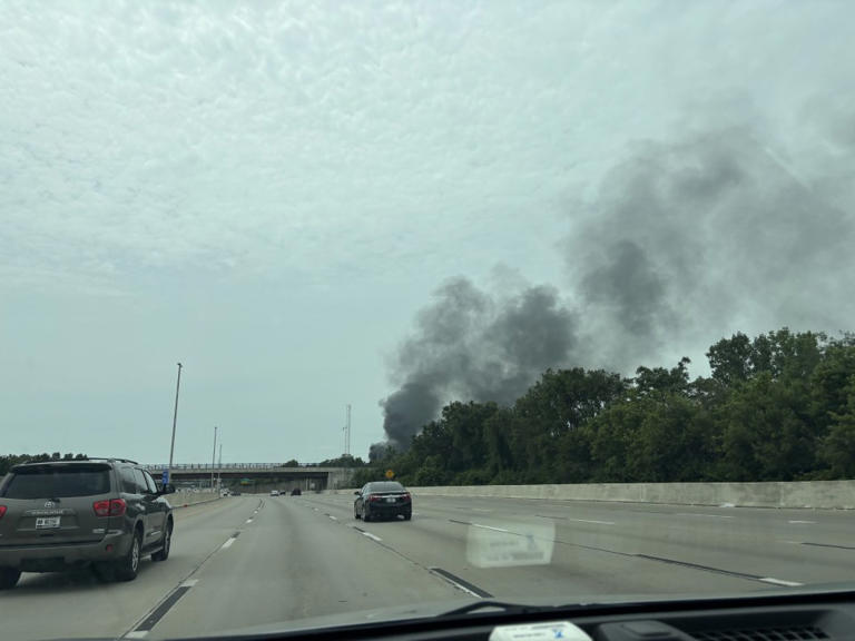 Garage fire causes black smoke to billow over I-465 on west side of ...