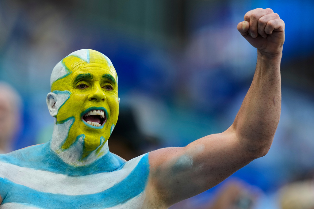 World Cup fans flood stadiums and fan zones with dazzling costumes ...