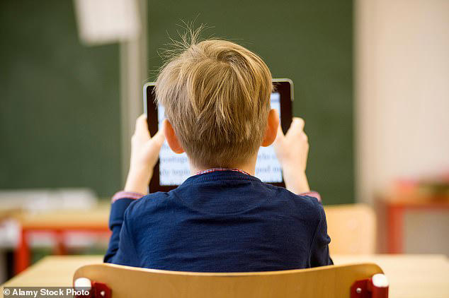 One million pupils spending nearly every lesson on a screen