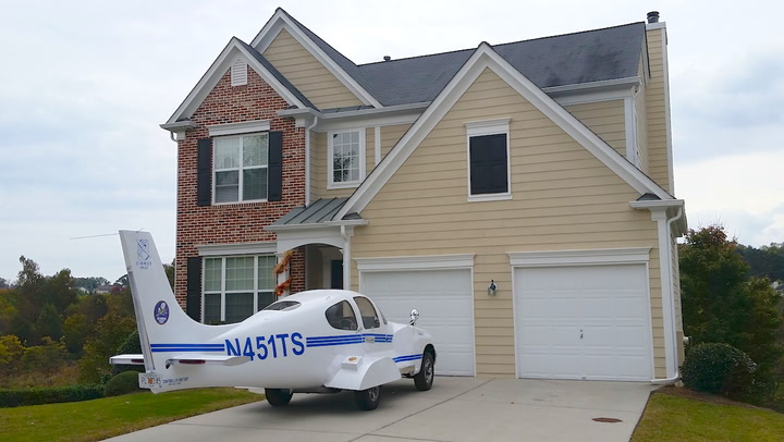 This man drives a real airplane on the highway