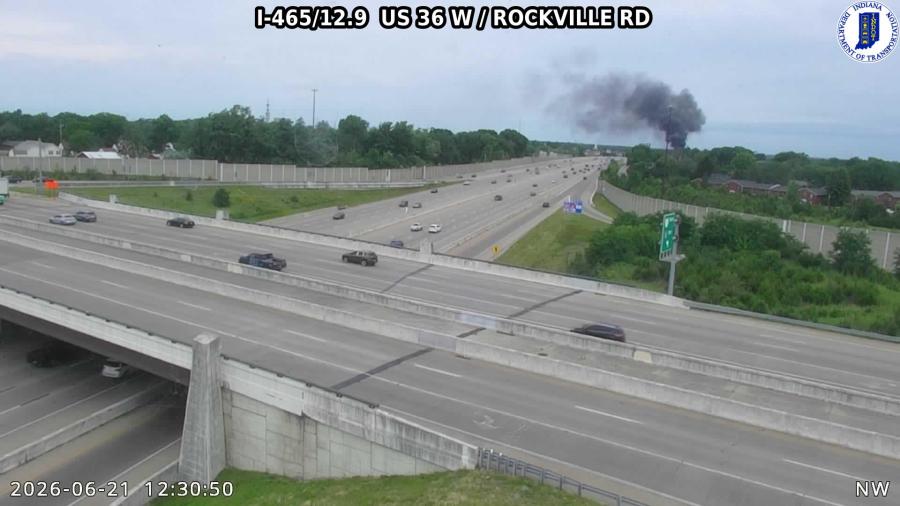 Garage fire causes black smoke to billow over I-465 on west side of ...