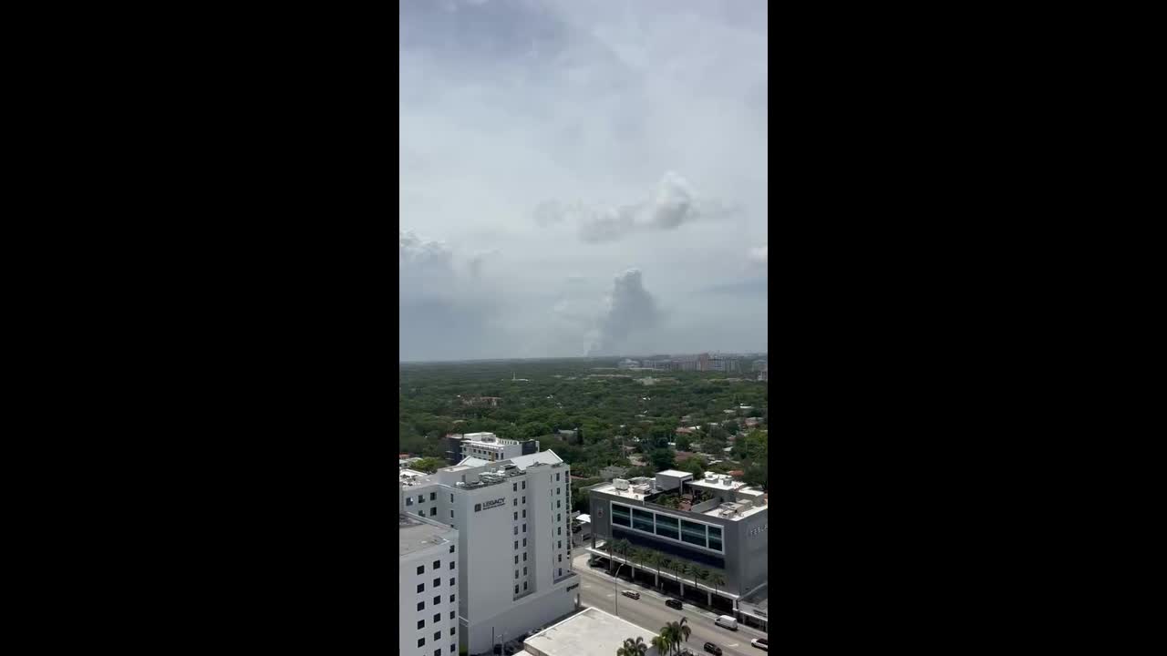 Massive wildfire smoke plume rises over skyline in Miami, Florida, USA