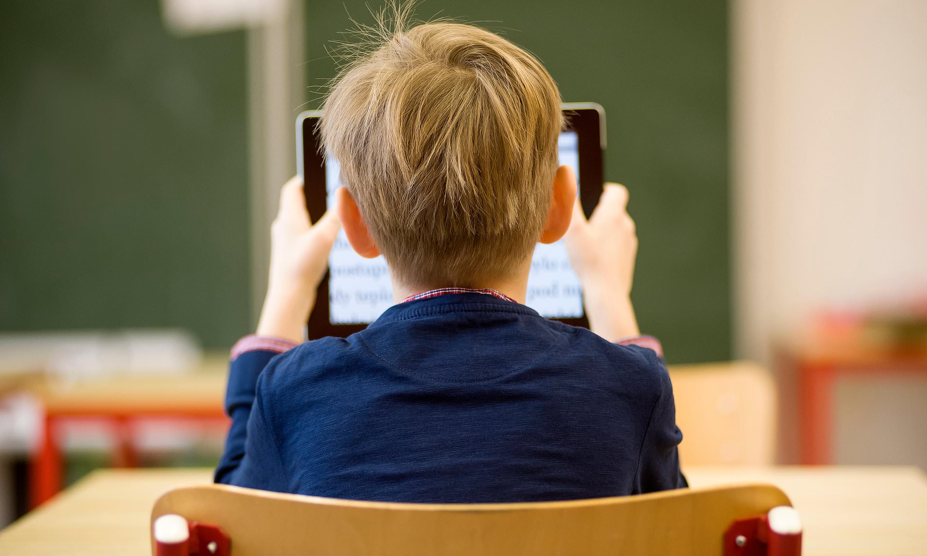 One million pupils spending nearly every lesson on a screen