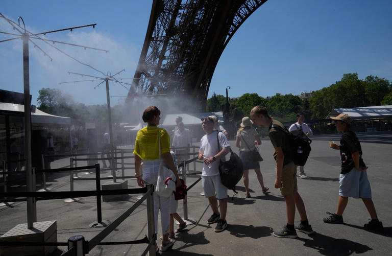 France restricts public alcohol consumption and outdoor sports as heat ...