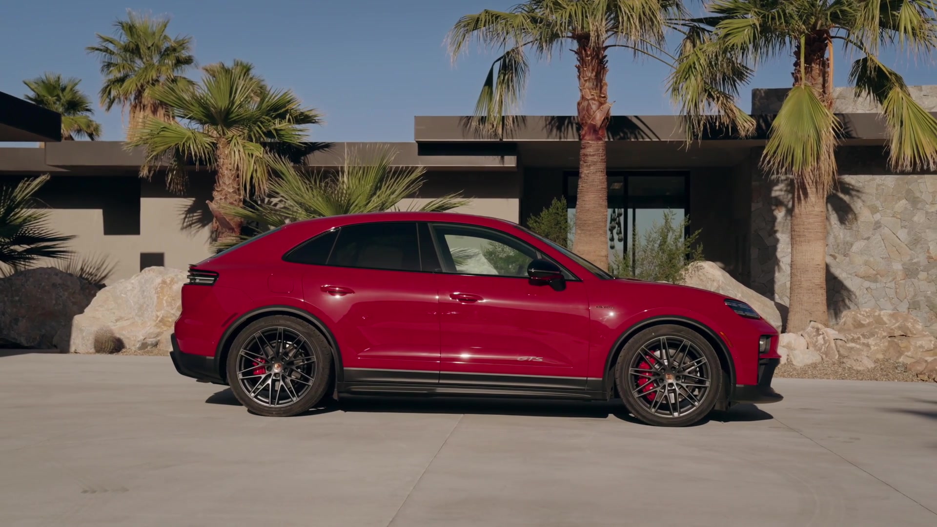 2026 Porsche Macan GTS electric design preview in Carmine Red