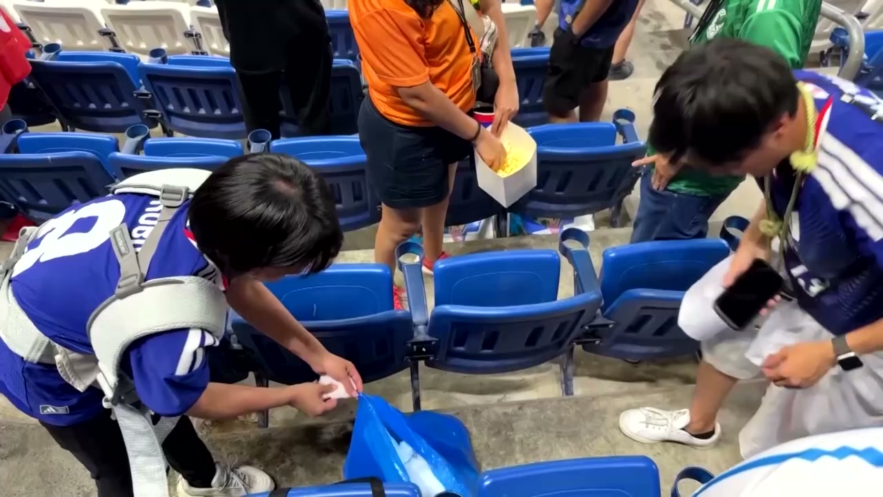Japanese fans clean up Monterrey's stadium after win against Tunisia