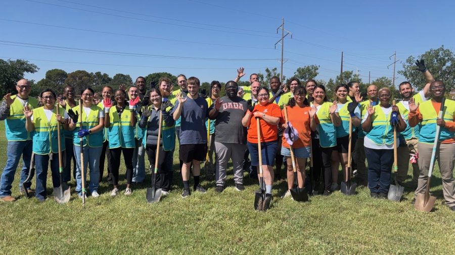 Volunteers brave the heat to plant trees at Bill and Ann Miller Park