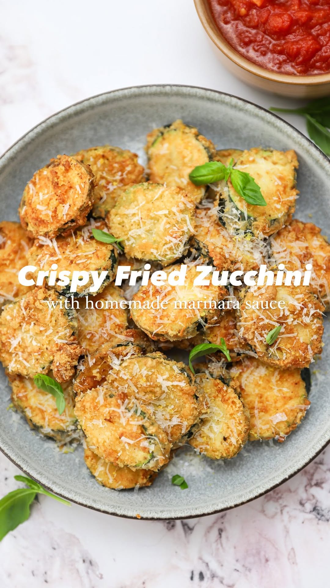Crispy fried zucchini rounds with homemade marinara sauce