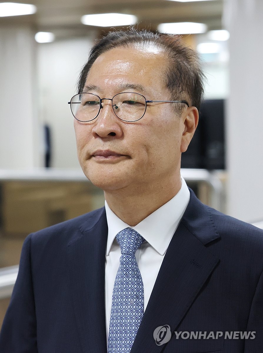 Ex-justice minister given 25-yr sentence for martial law role