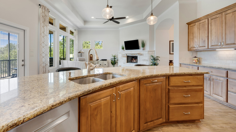 Not bright white: The paint color that gives dated honey oak cabinets a ...