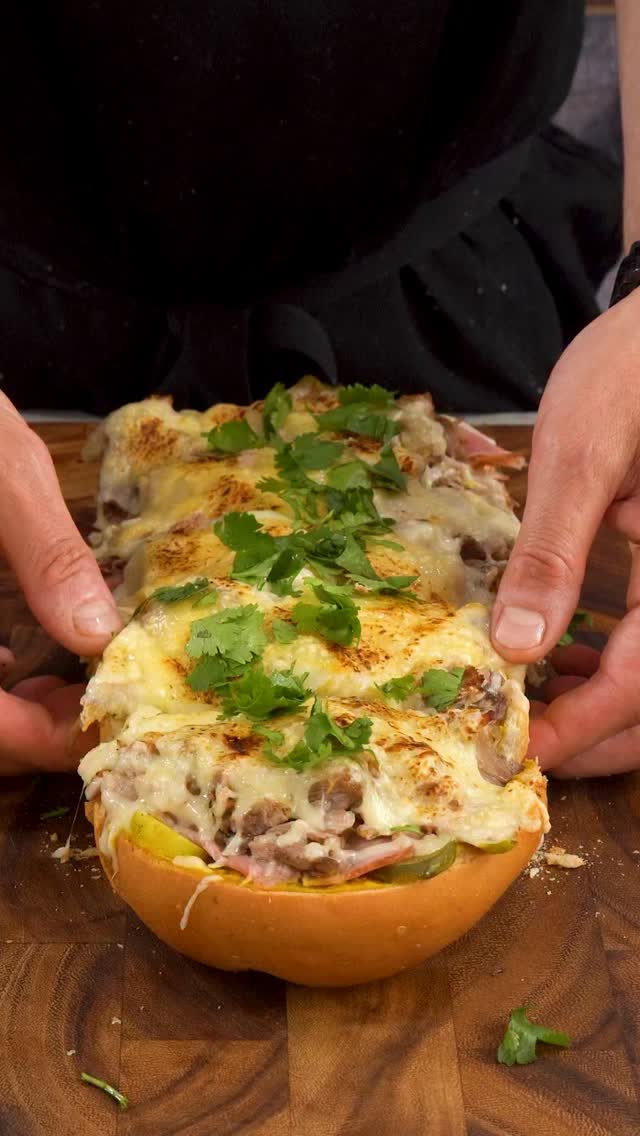 Cubano open-faced loaf with melted Swiss