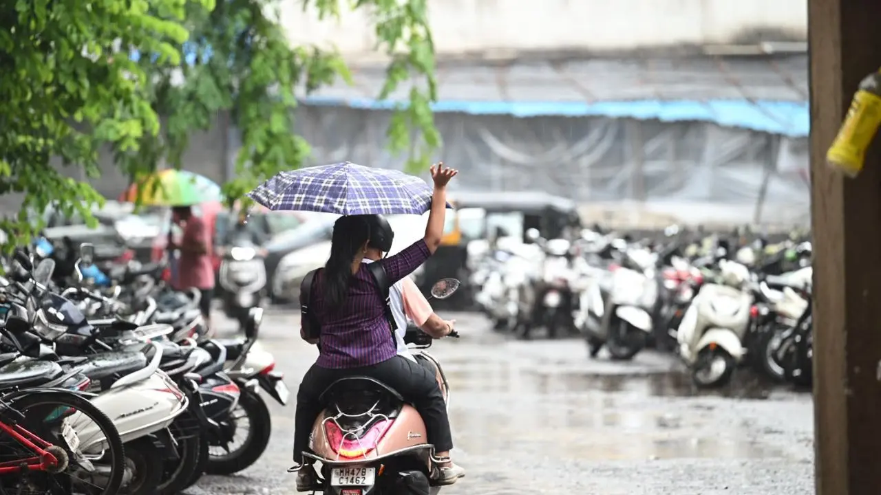 In photos Mumbai rains bring relief from humid weather IMD forecasts ...