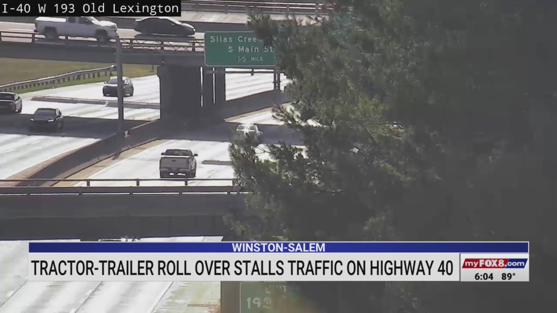 Tractor-trailer overturns, stalls traffic in Winston-Salem