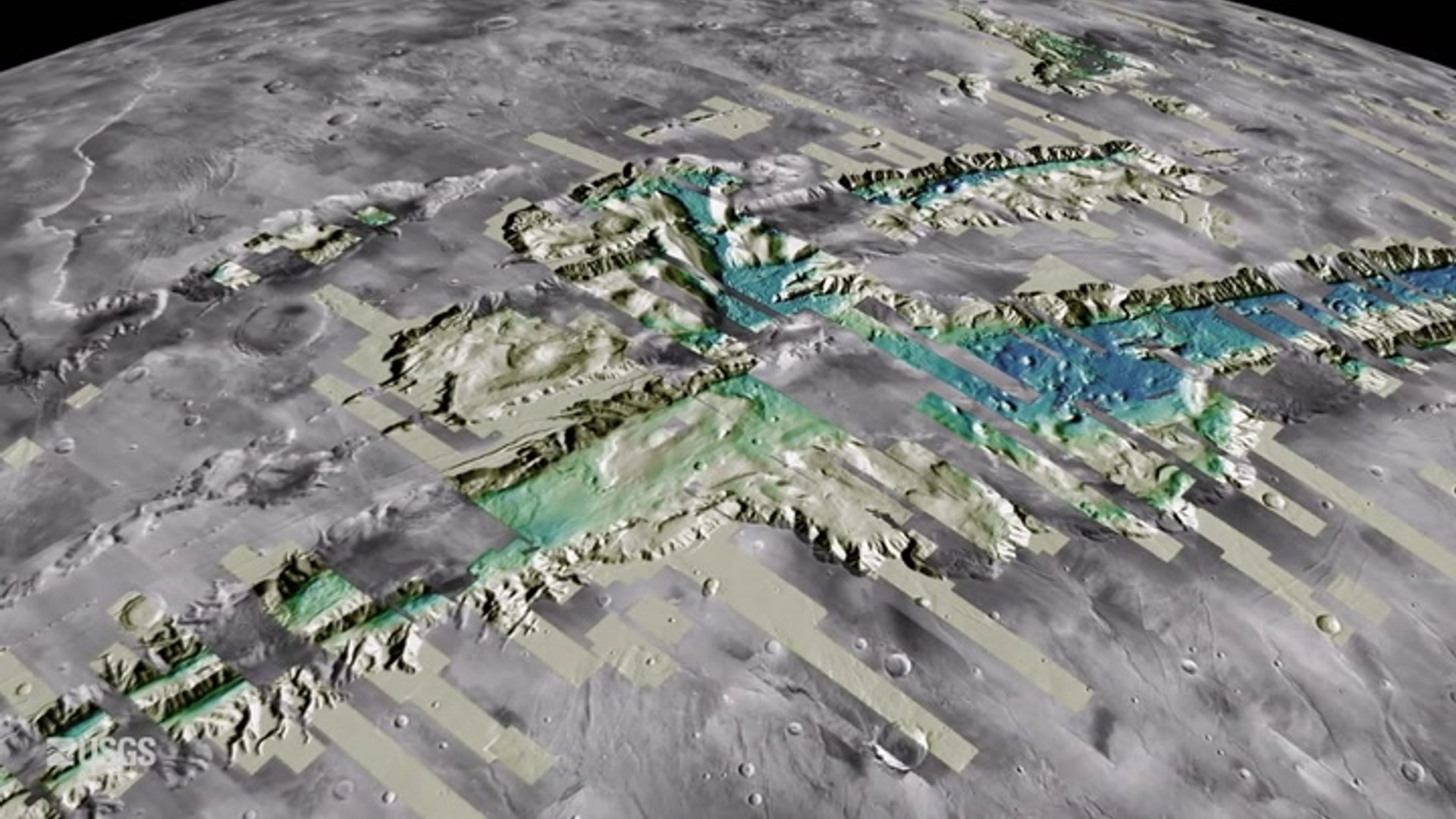 Fly over the 'Grand Canyon' of Mars in high-resolution orbiter imagery