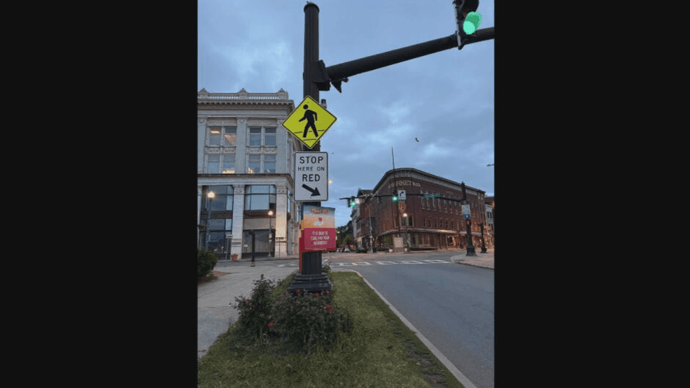 Troy panhandling signs vandalized with decals