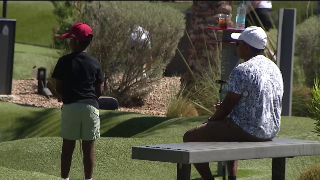 Dads celebrate Father's Day at the mini golf course