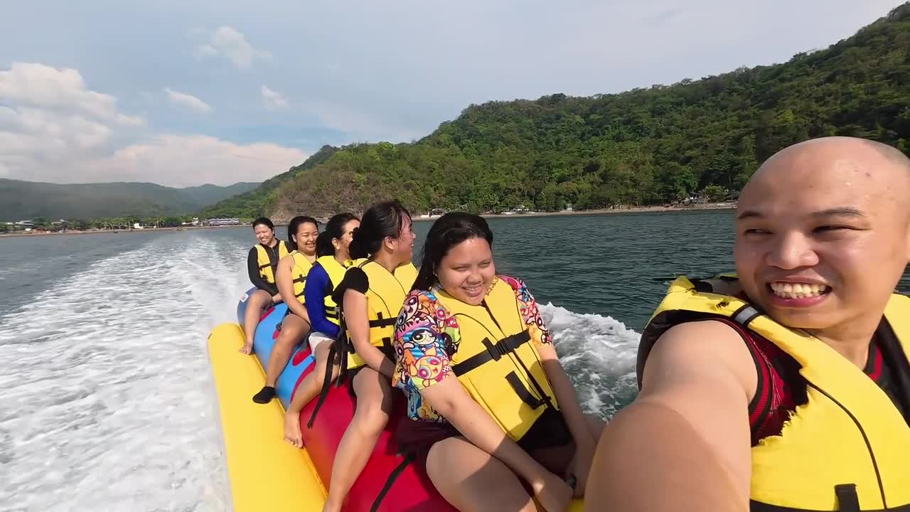 Boyfriends take banana boat riding to another level