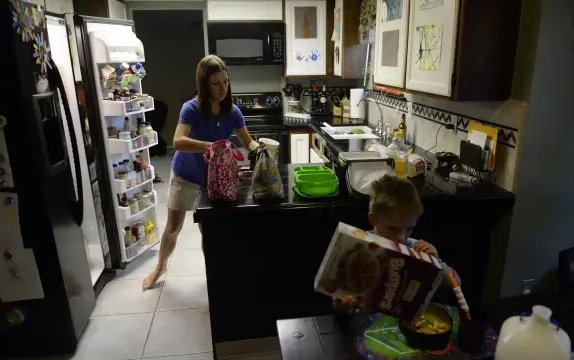 Record share of US couples work full time, moms still do more at home