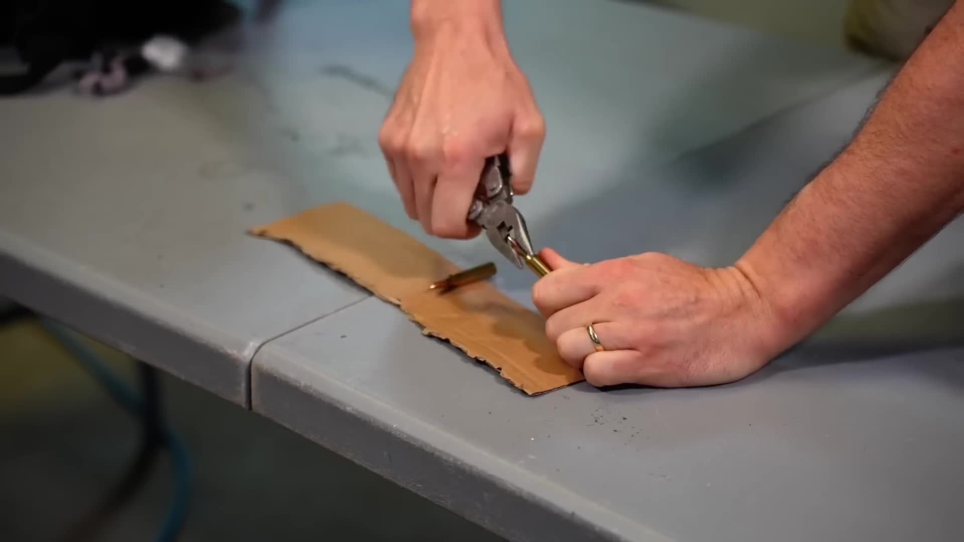 Starting a survival fire using nothing but a live round