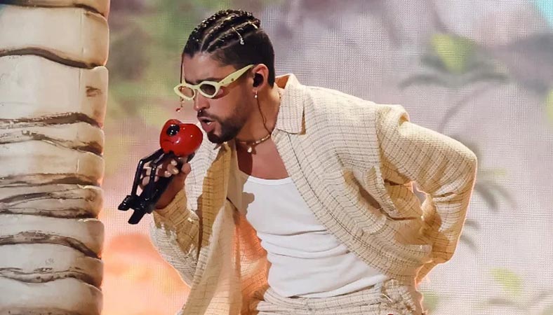 Bad Bunny makes history as first Latin artist to surpass $1 billion ...