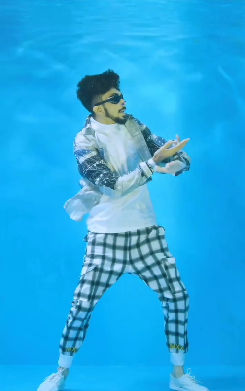 Performing traditional bhangra dance underwater