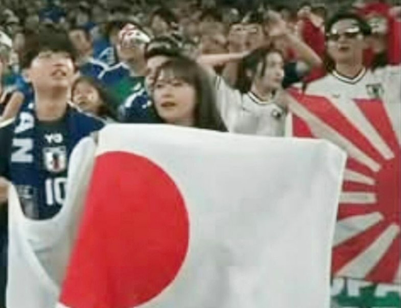 Football fans display Rising Sun flag at World Cup match and reignite ...
