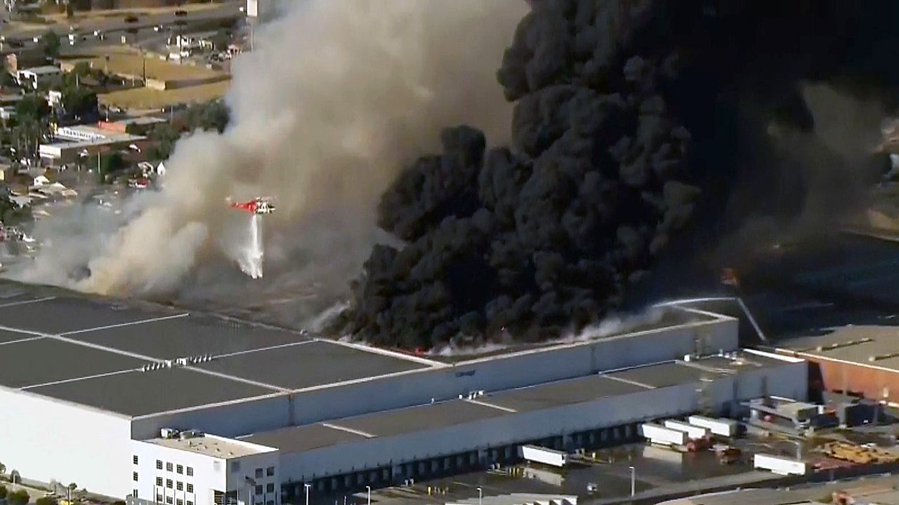 Los Angeles declares state of emergency as warehouse fire burns for ...