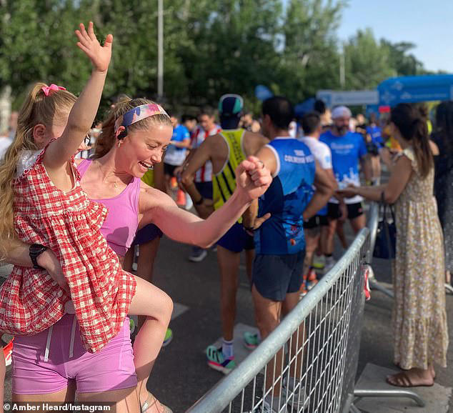 Amber Heard shares rare glimpse of daughter after finishing Spain 10k