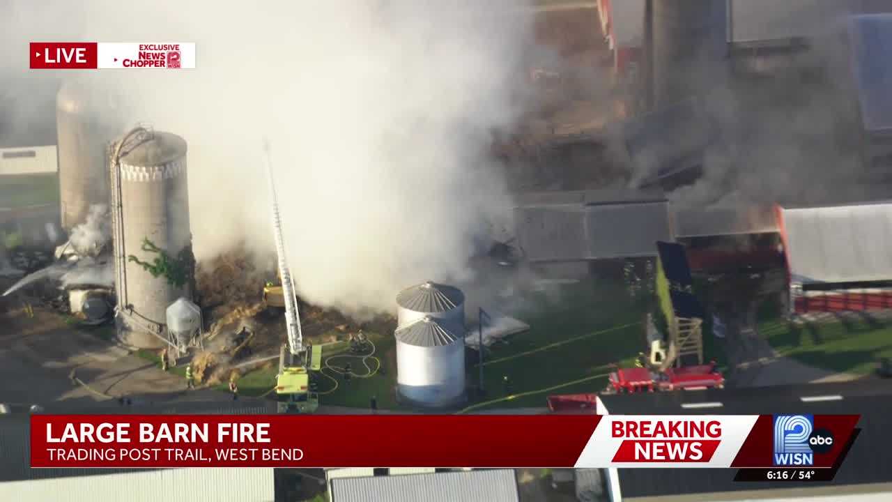 Crews battle barn fire at West Bend dairy farm, cows moved to safety
