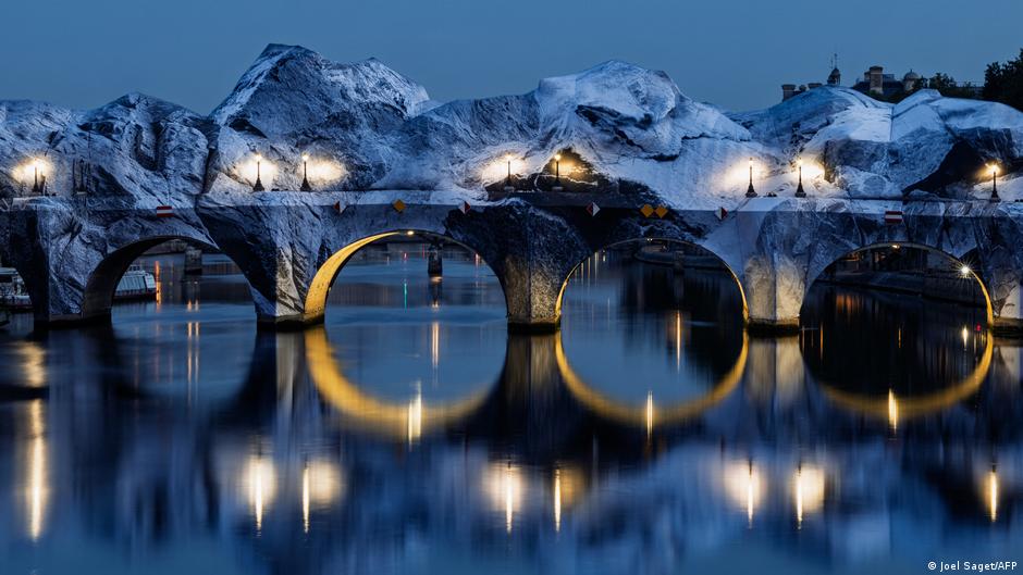 Christo-like art project turns Parisian bridge into cave