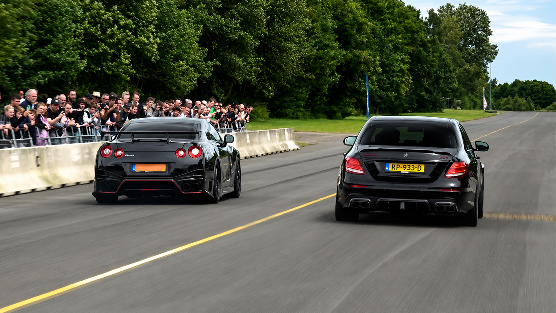 Mercedes Brabus 700 meets Godzilla on the drag strip