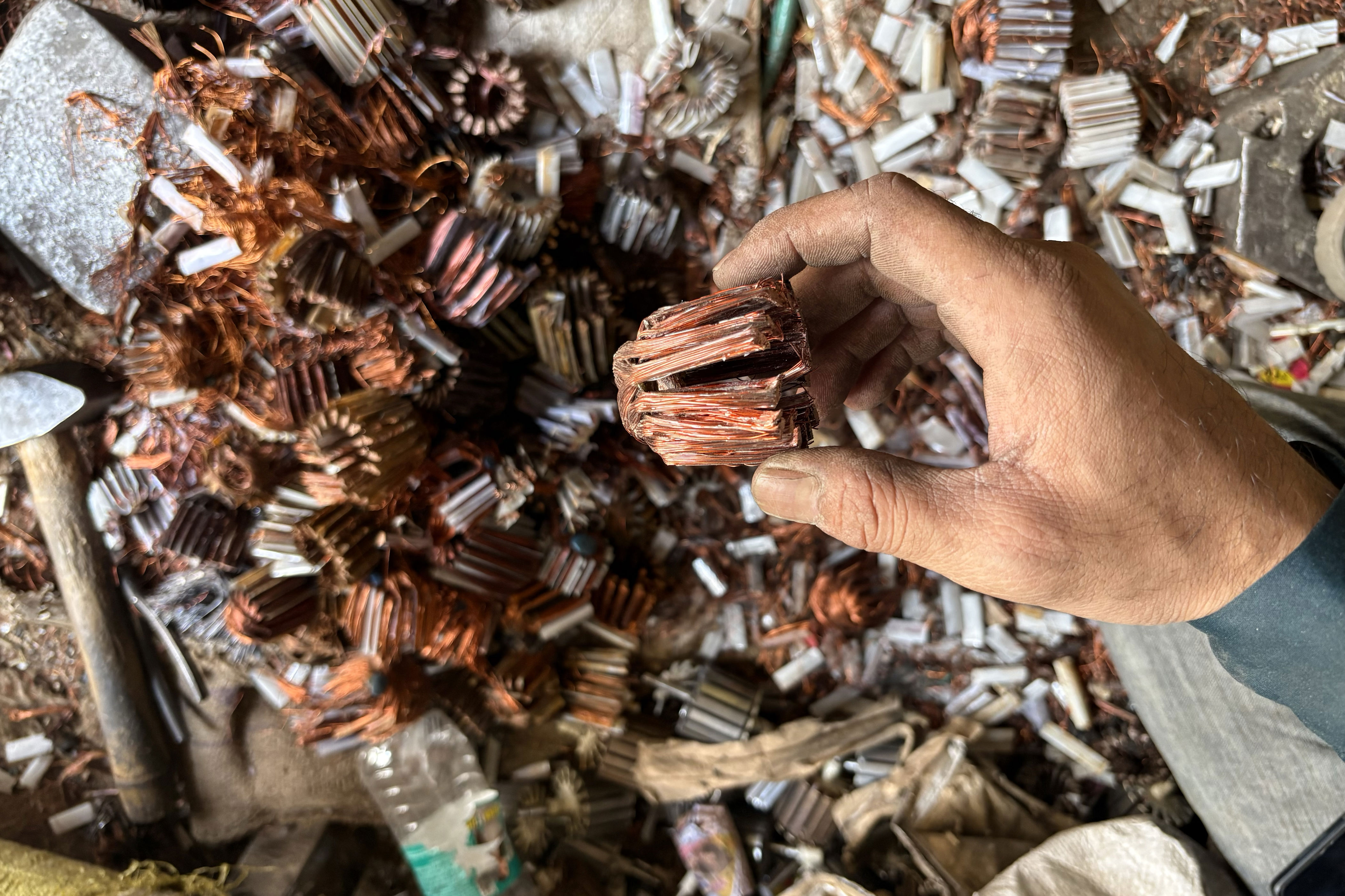 ‘Daily cuts… infections’: India’s e-waste workers face toxic health risks