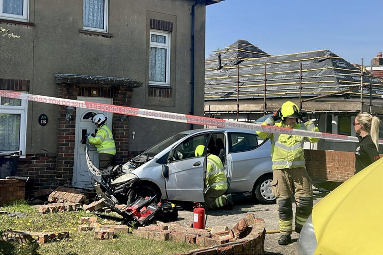 Driver taken to hospital amid 'collision involving a vehicle and a ...